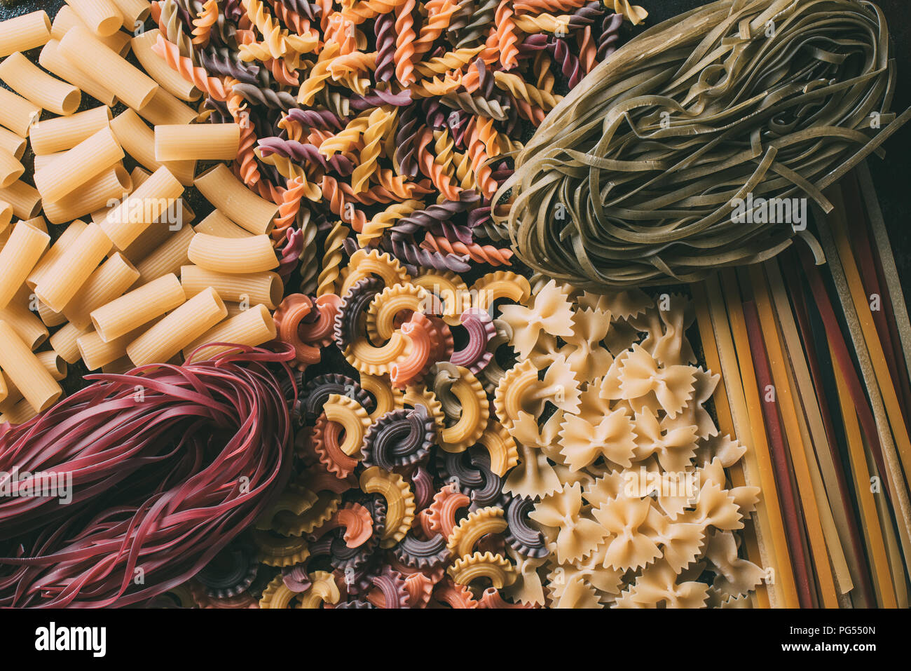 elevated view of different types of colorful pasta Stock Photo - Alamy
