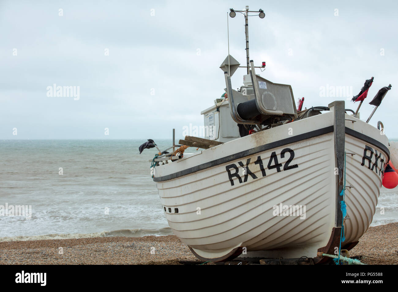 Small local fishing Boat seen on Hastings beach Stock Photo - Alamy