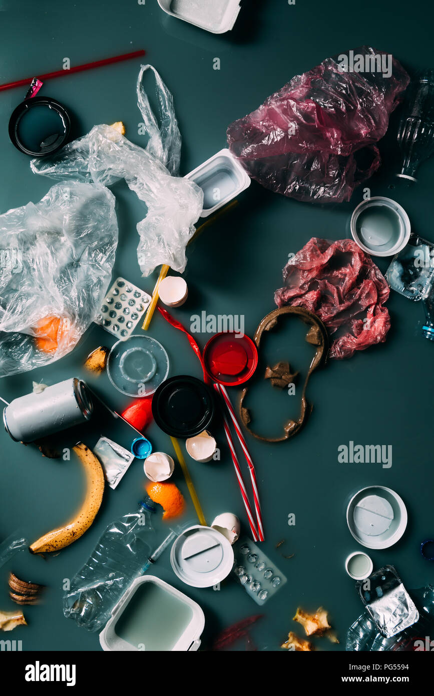 top view of garbage flowing in water, ecology protection and recycle ...