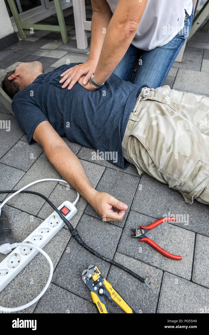 Symbolic picture, first aid, scene posted, resuscitation with a cardiac ...