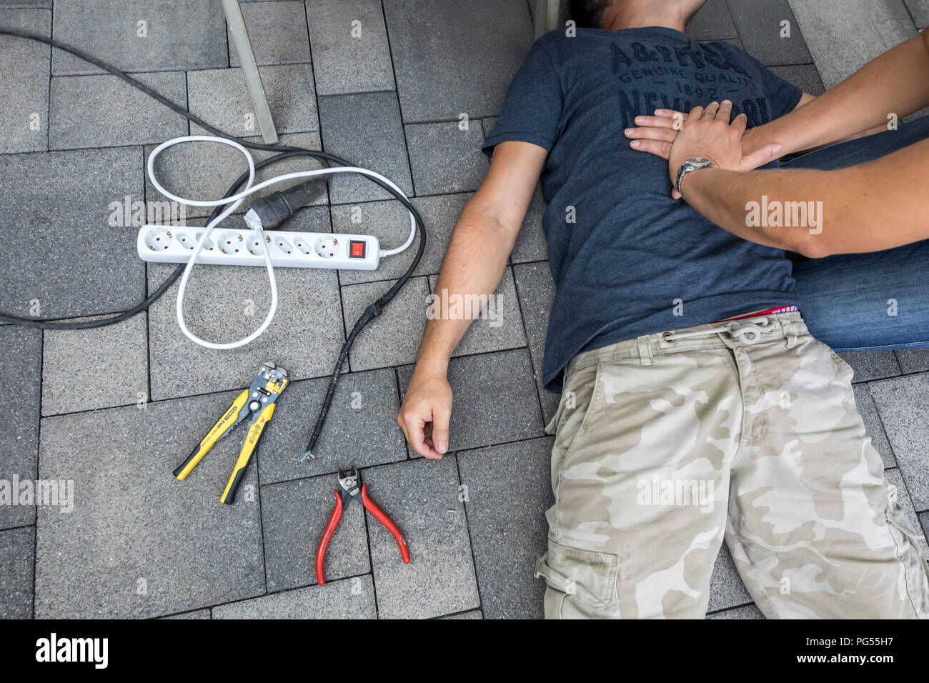 Symbolic picture, first aid, scene posted, resuscitation with a cardiac ...