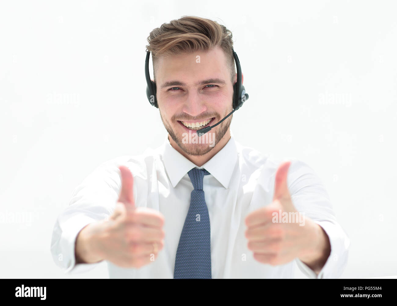 close up.smiling call center employee showing thumbs up Stock Photo - Alamy