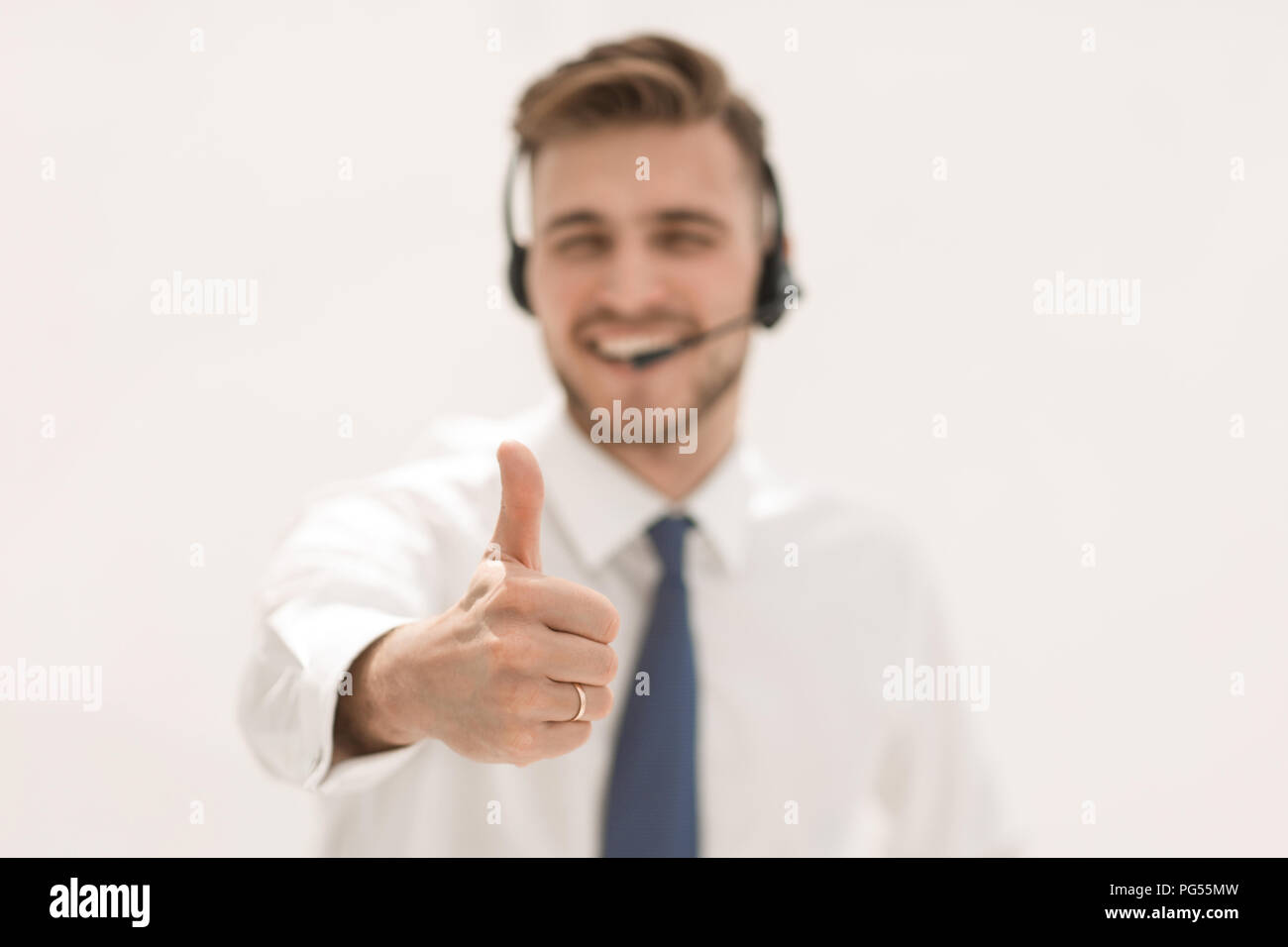 close up.employee call center showing thumb up Stock Photo - Alamy