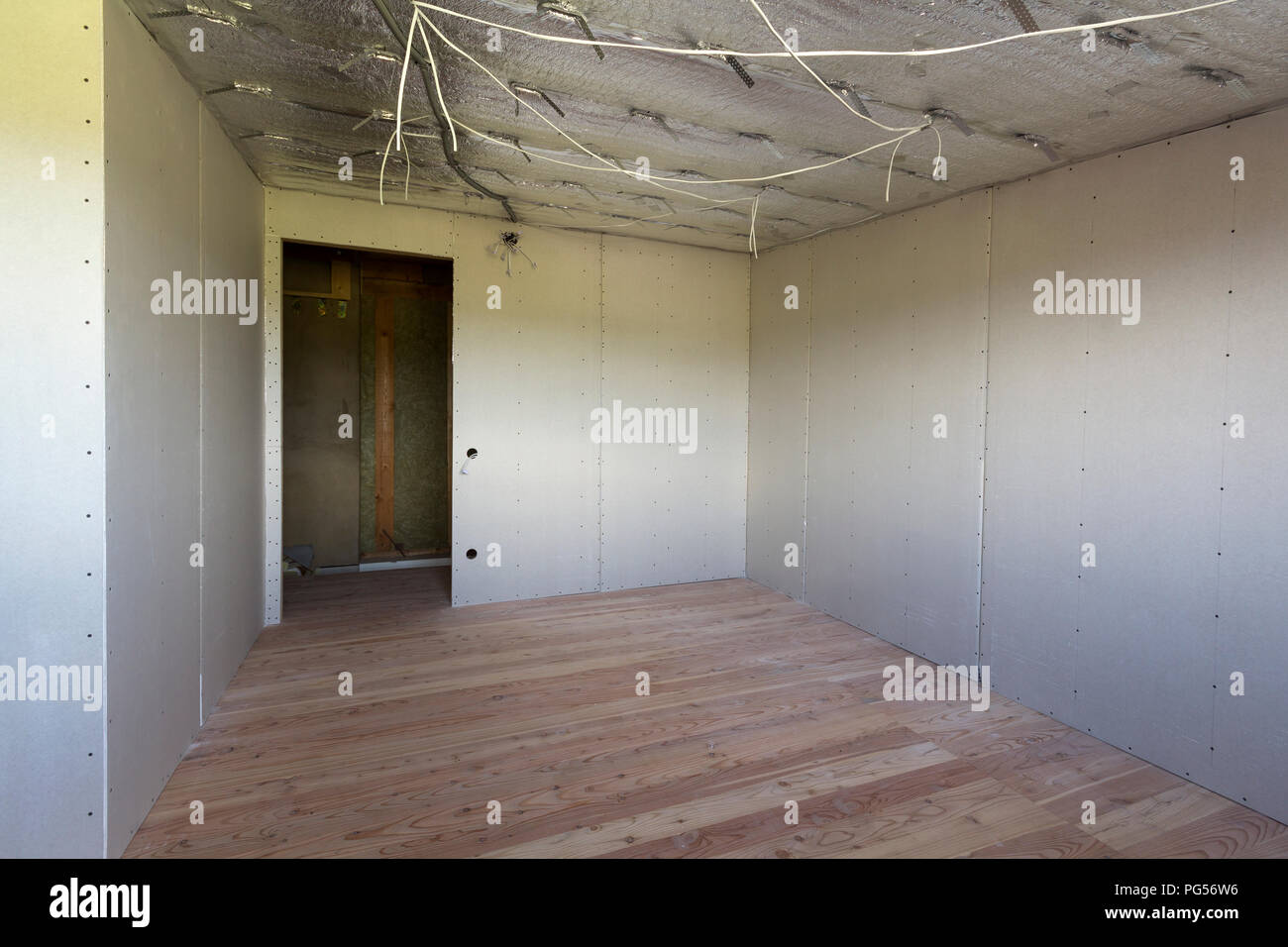 Big empty room under construction and renovation with silver aluminum ...