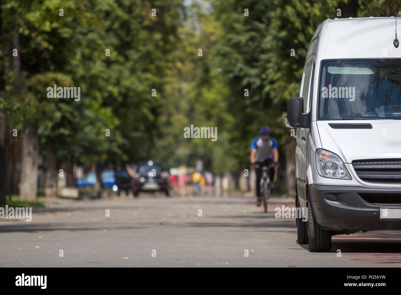 White passenger medium size commercial German luxury minibus van parked ...