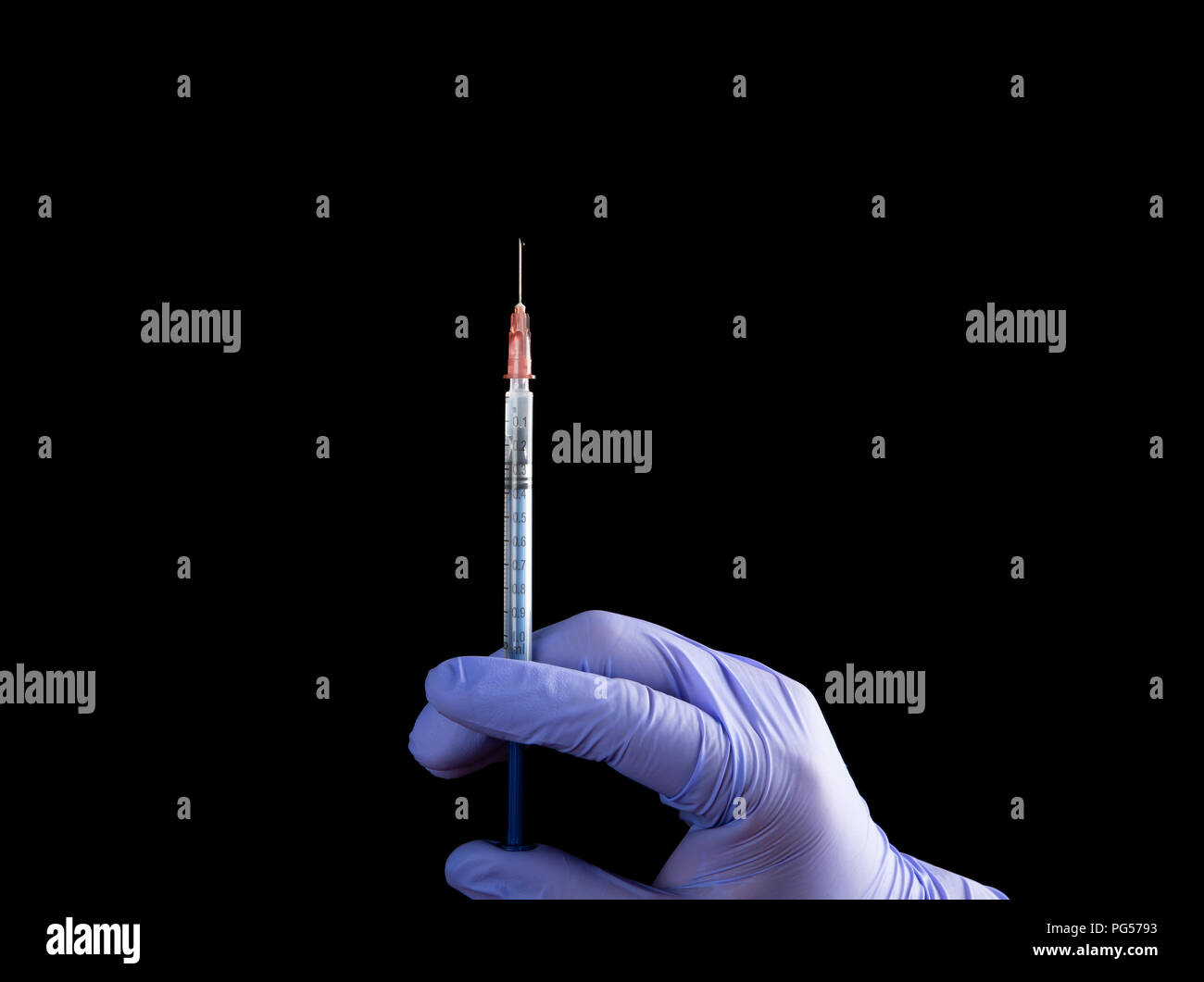 hands holding syringe medical injection on black background Stock Photo ...