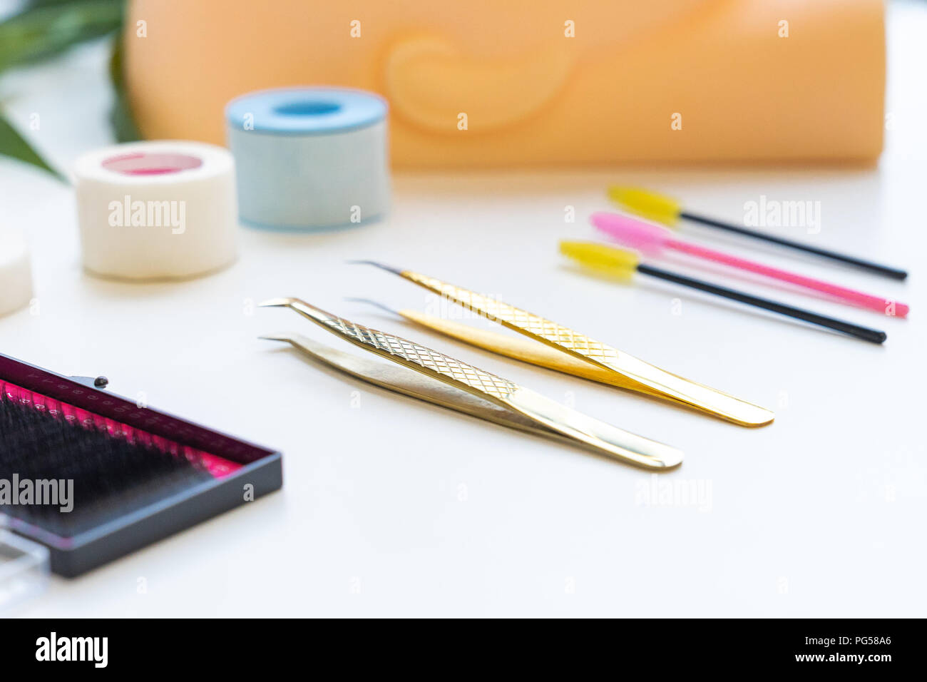 eyelashes extension tools , close up metal Twizzlers Stock Photo - Alamy