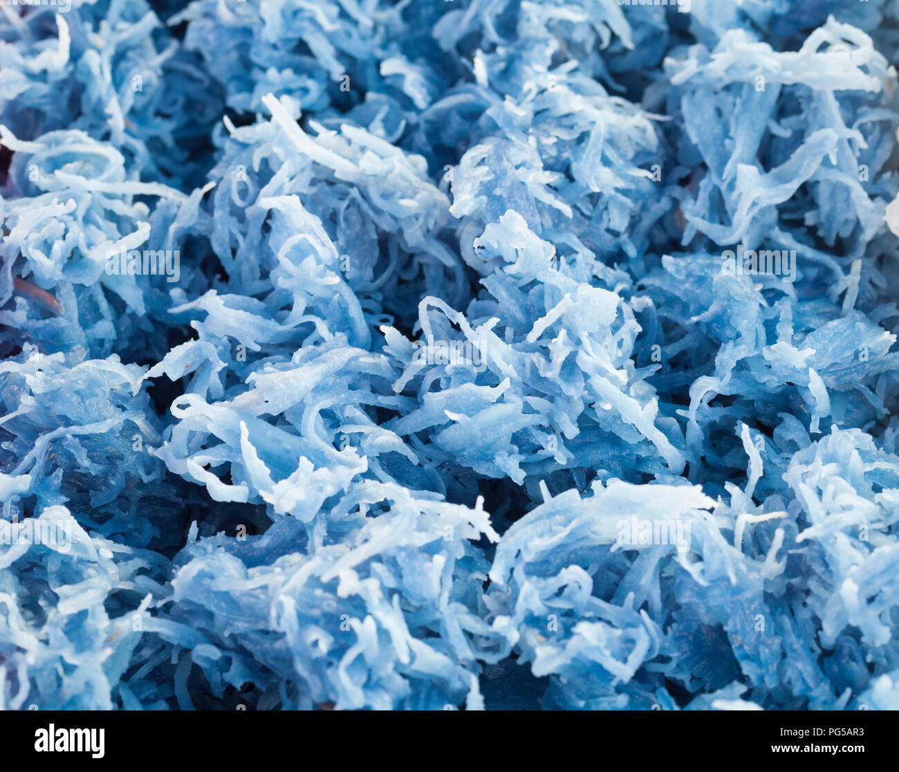 Thai coconut pancake, a dessert made from sliced coconut with tapioca ...