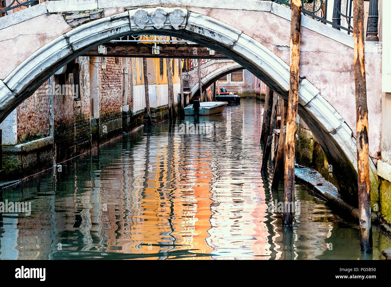 Little bridge on a canal in the medieval center of Venice Stock Photo ...