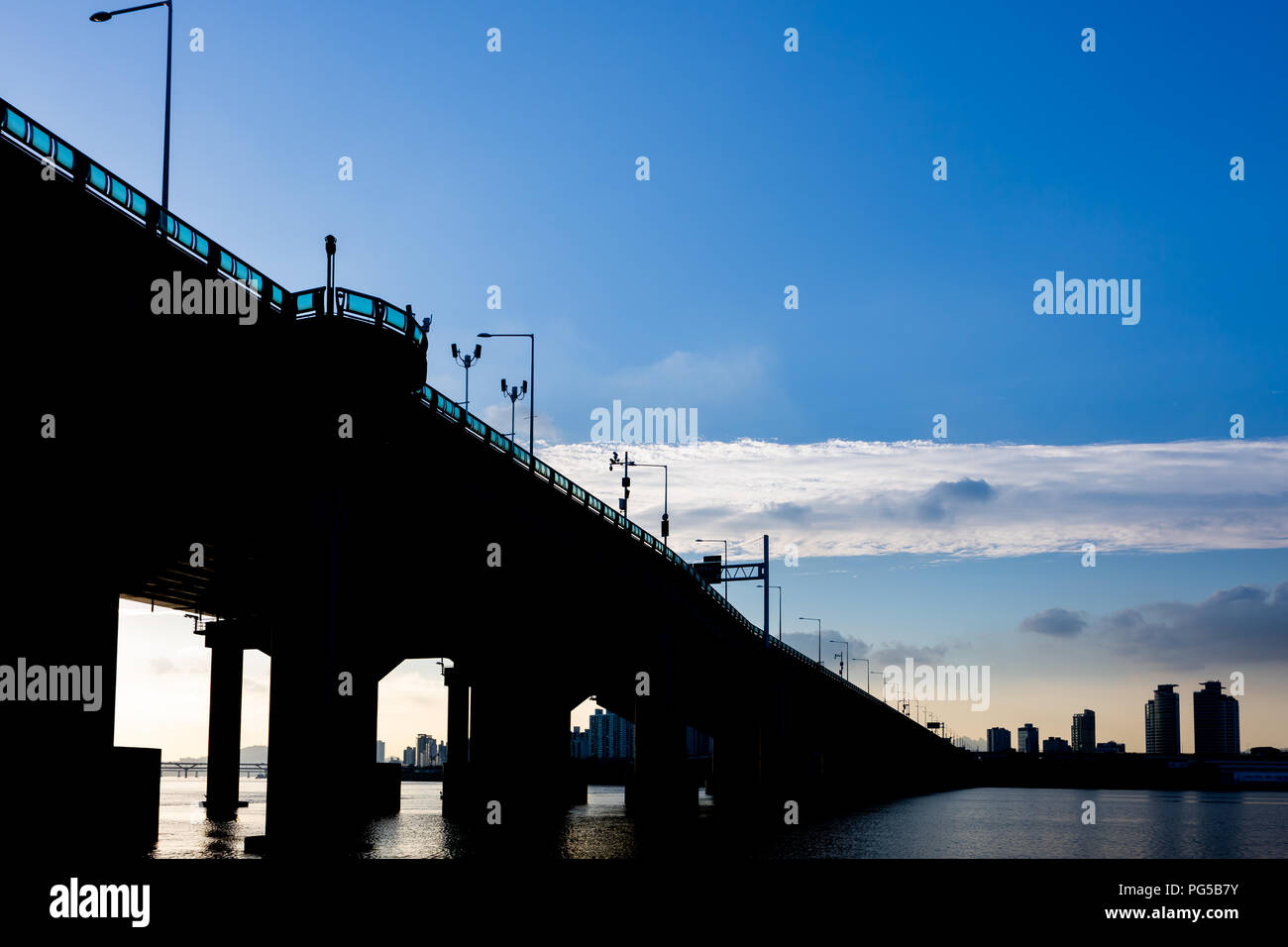 Skyline and citiscape with silhouette of Jamsil bridge, Seoul, Korea ...