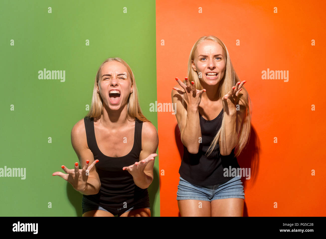 Screaming, hate, rage. Crying emotional angry women screaming on studio ...