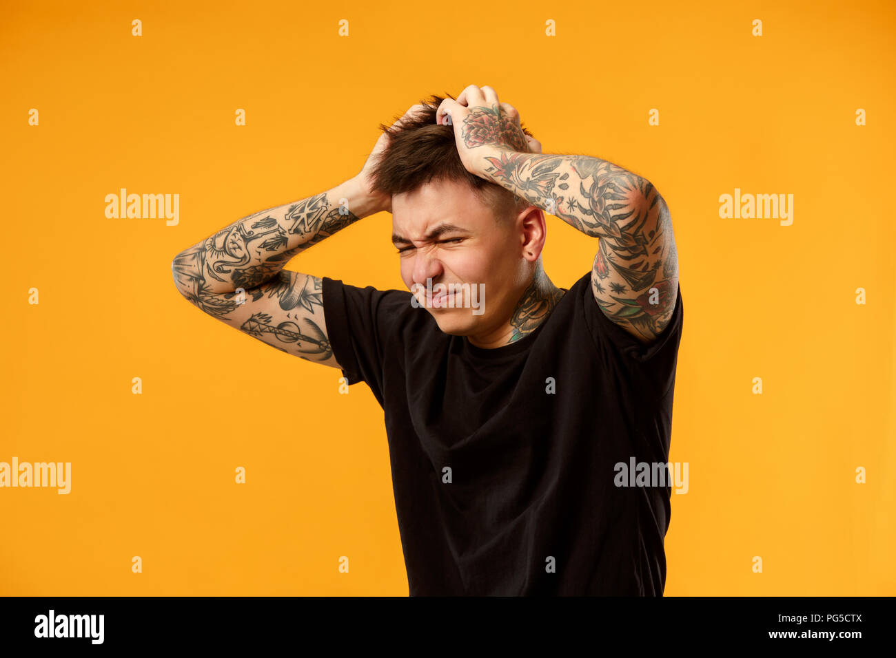 Man having headache. Isolated on studio background. Business man ...