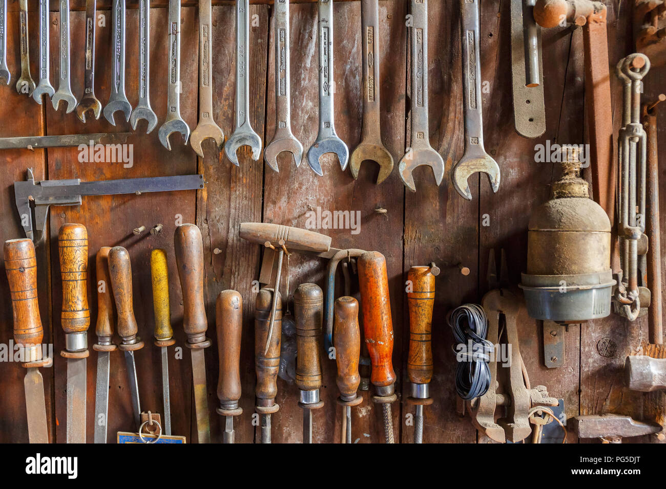 Old tool panel with various tools Stock Photo - Alamy