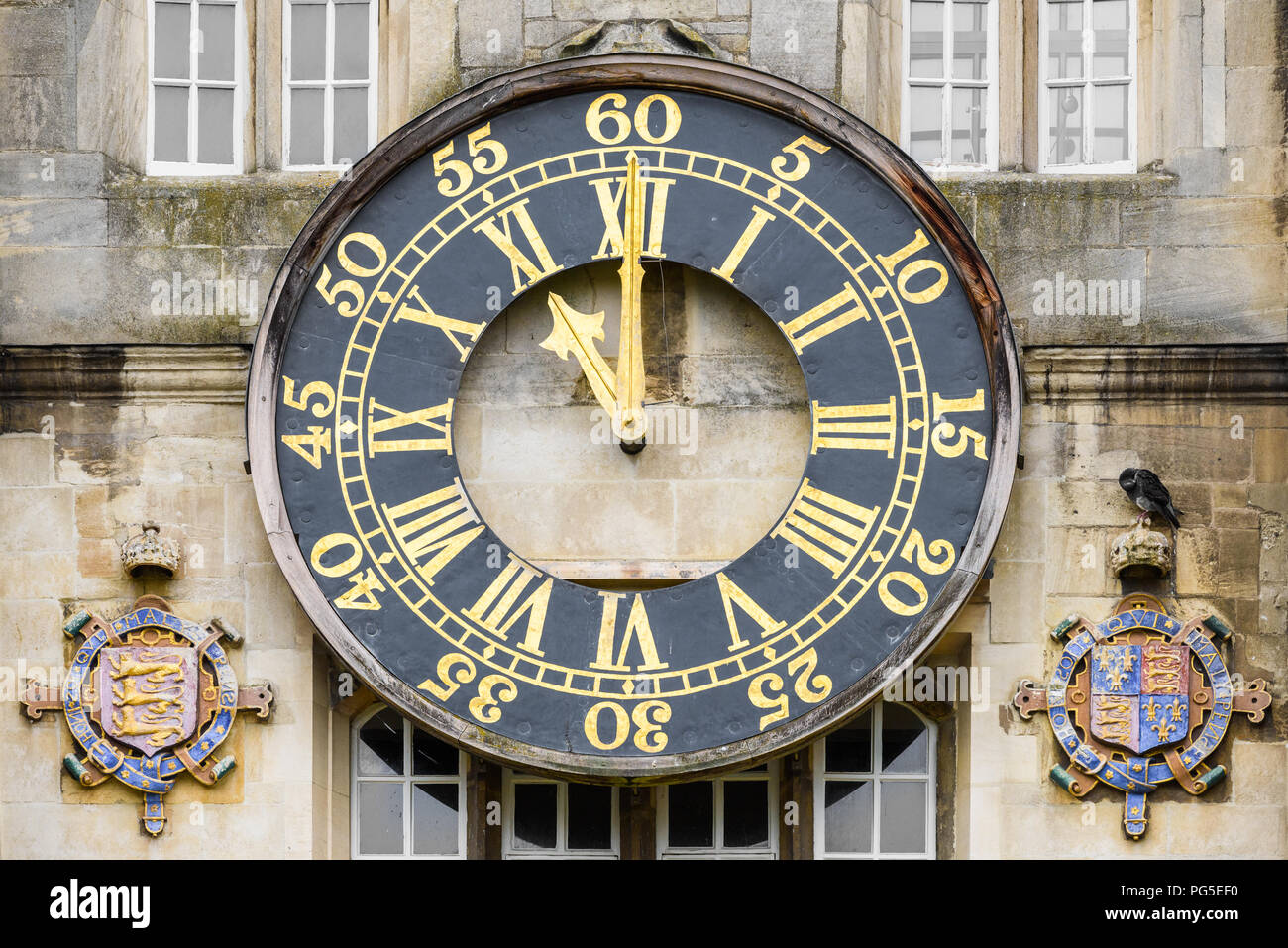 Clock showing eleven o'clock in the Great Court at Trinity college ...