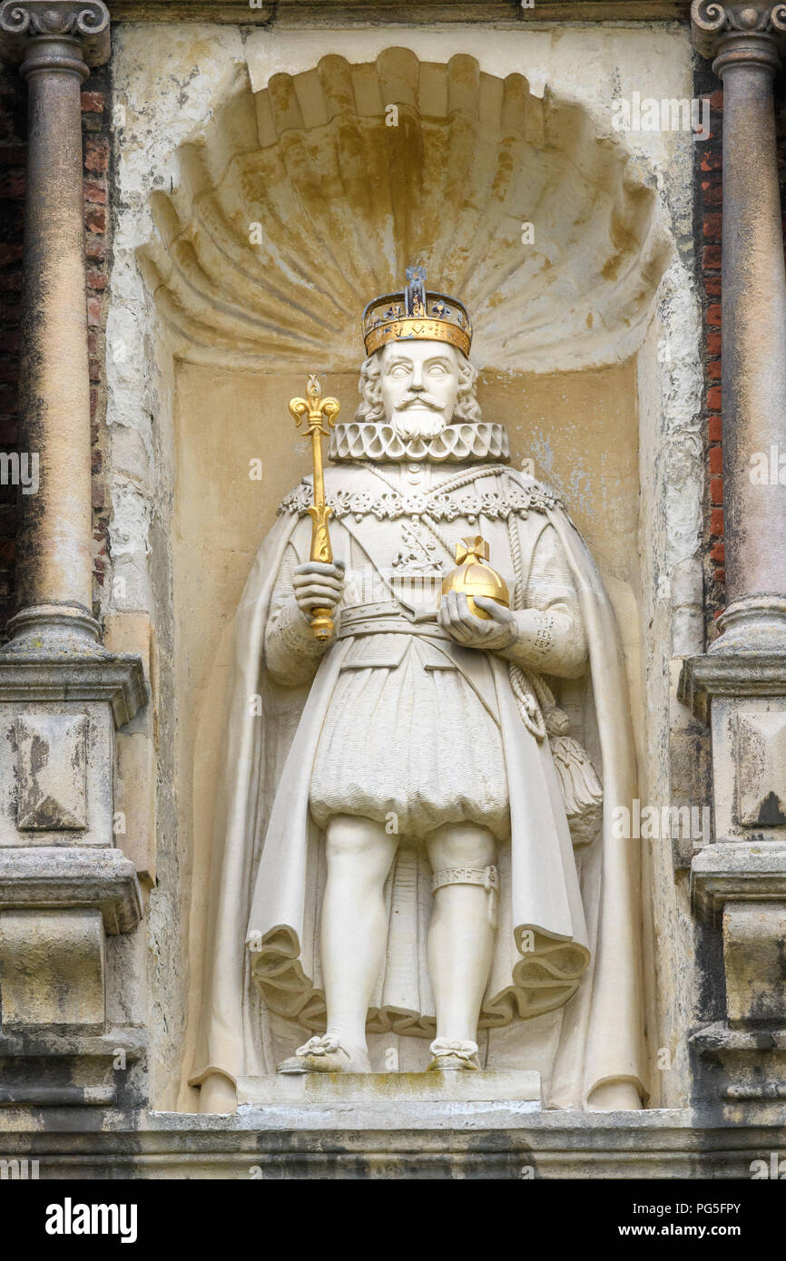Statue of king James I (or VI) with orb and scepter on the west tower ...