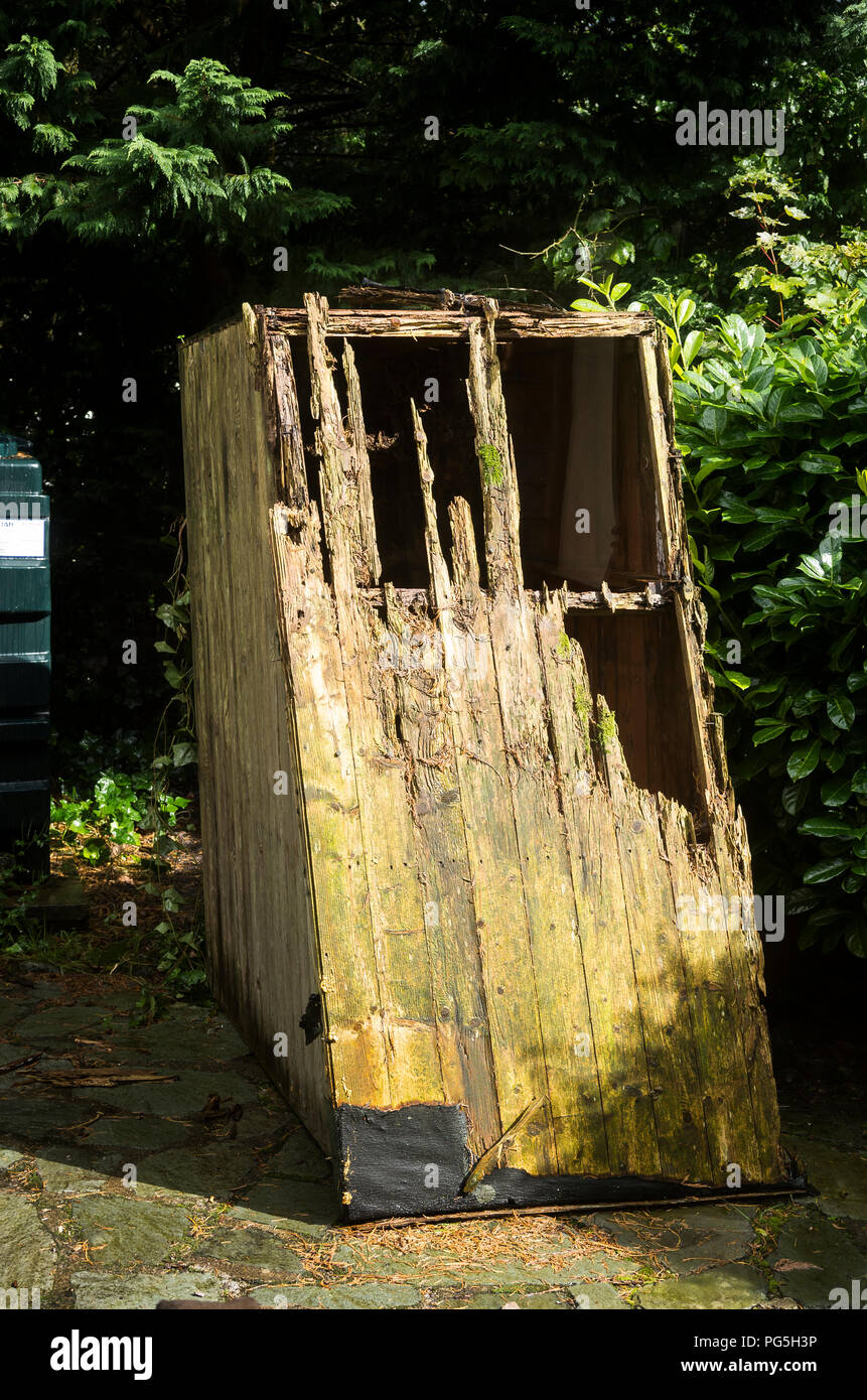 A rather ramshaackle old wooden garden building at end of its life in ...