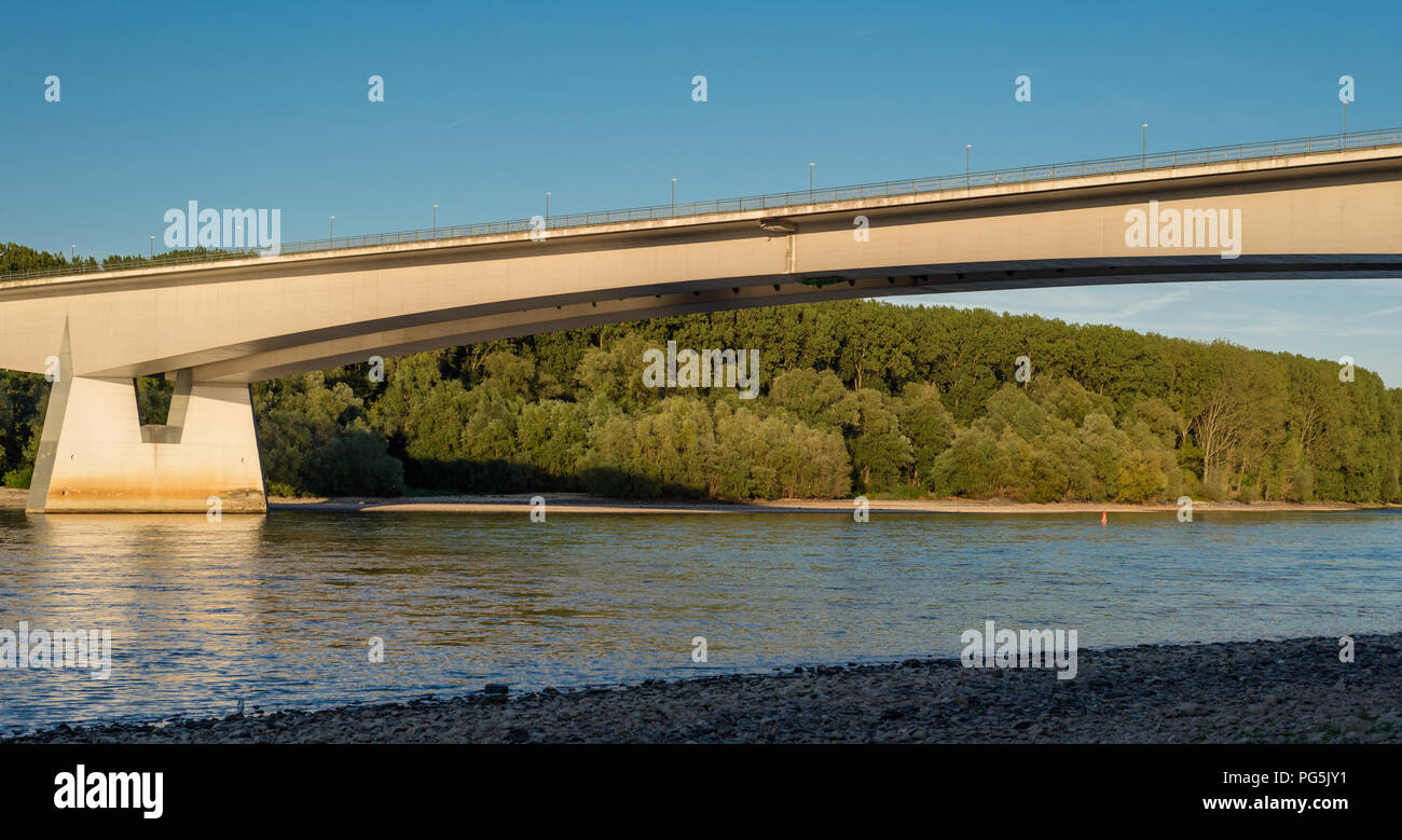 Concrete road bridge on the highway over a river in western Germany on ...