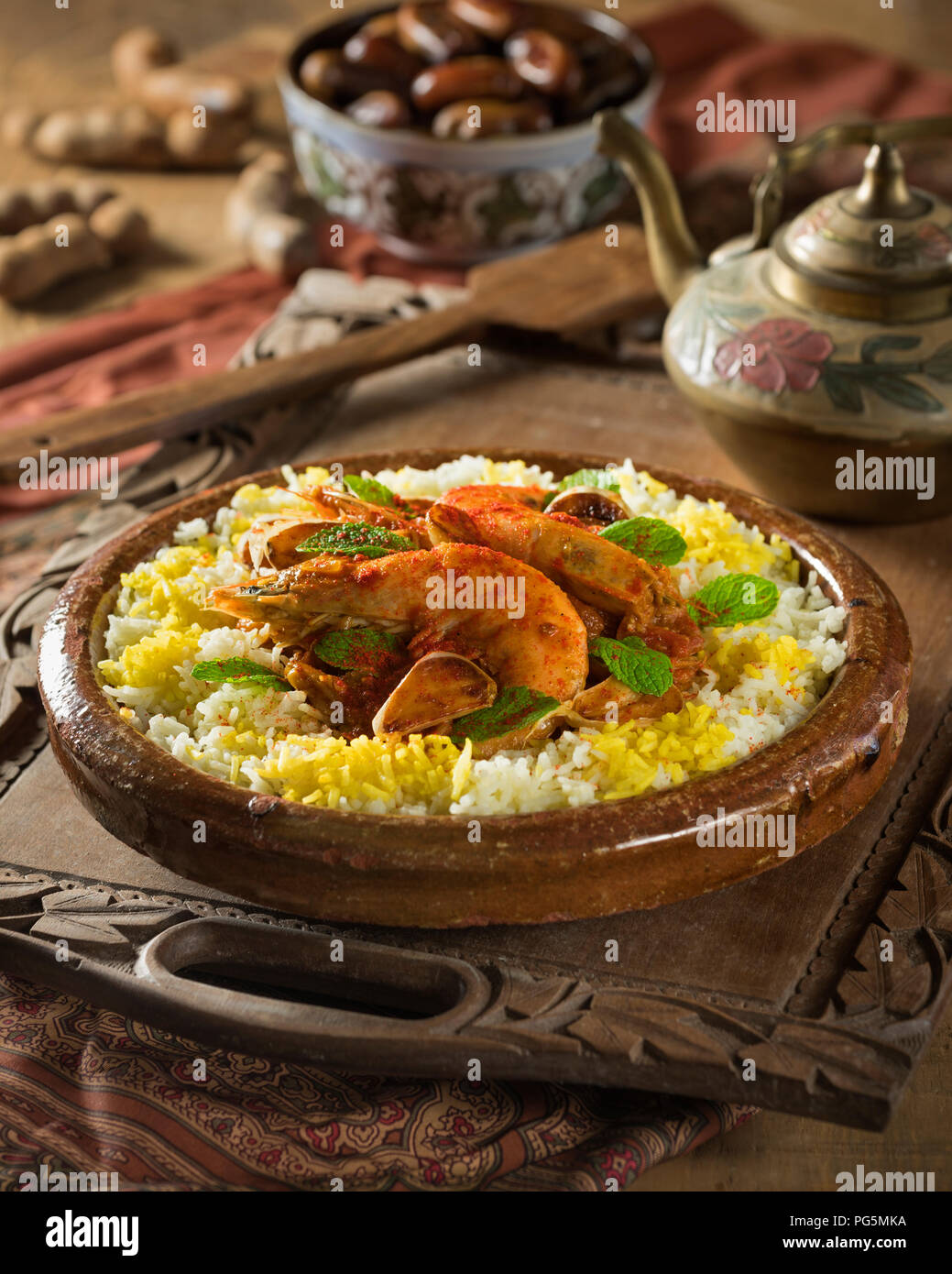 Ghalieh Maygu. Persian Gulf style shrimp with herbs and tamarind Stock ...