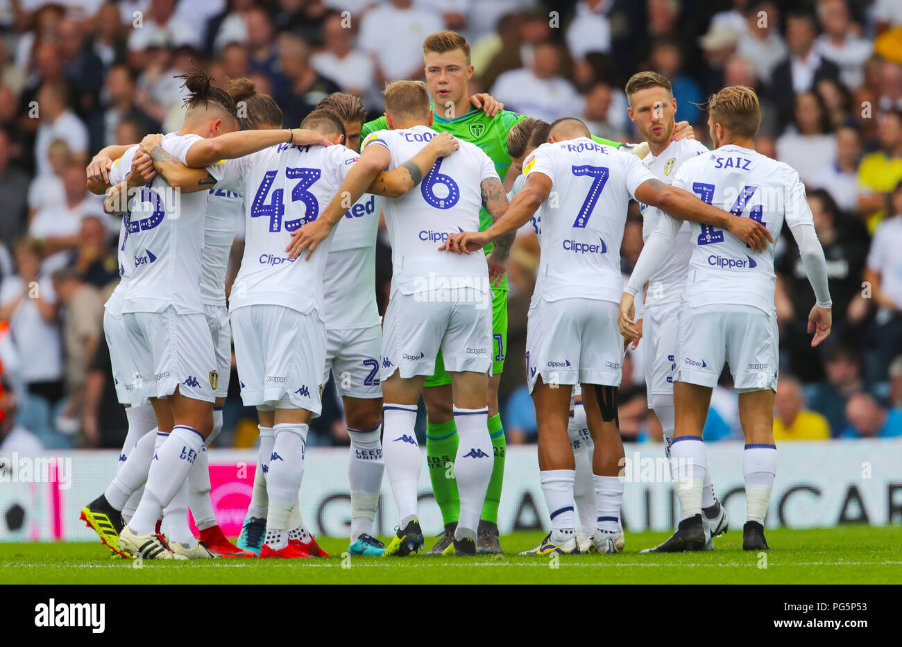 Leeds United players in a huddle Stock Photo - Alamy