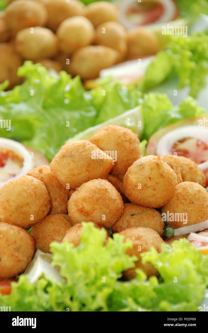 Delicious Brazilian snack, cassava and meat Stock Photo - Alamy