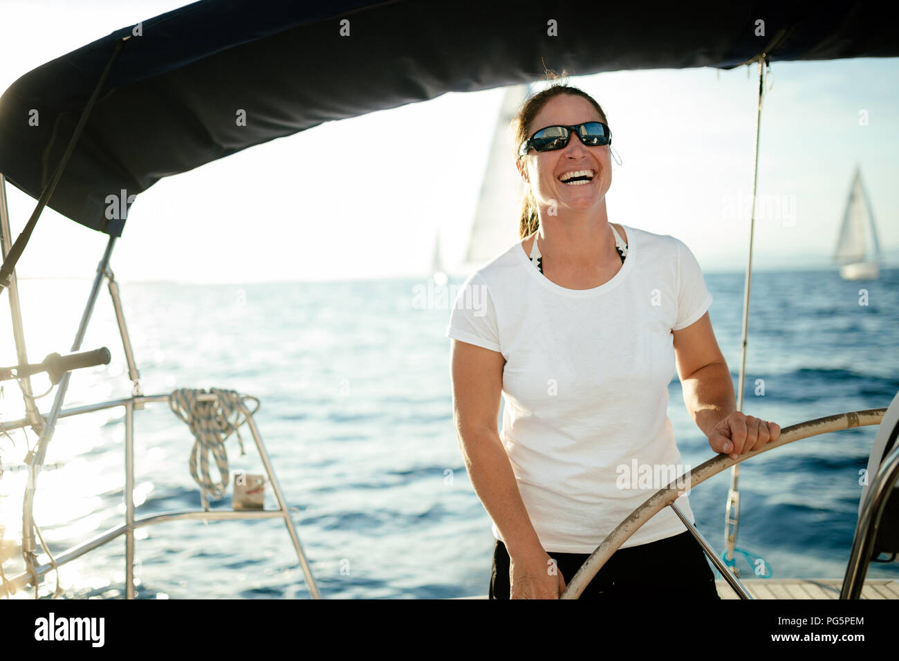 People enjoying yacht race hi-res stock photography and images - Alamy