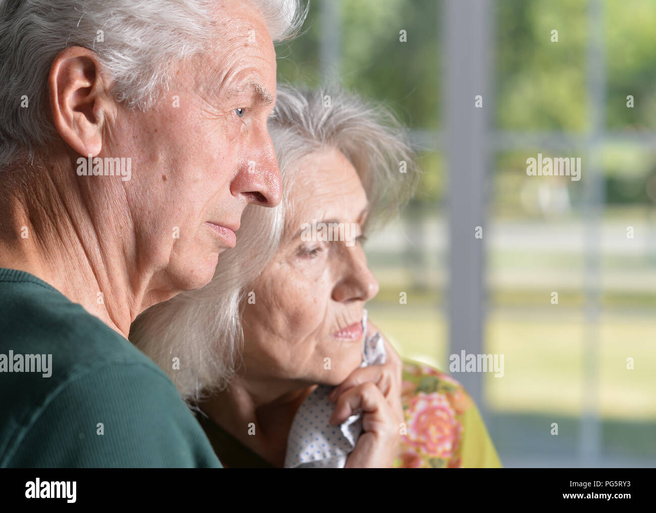 Man woman couple older sad hi-res stock photography and images - Alamy