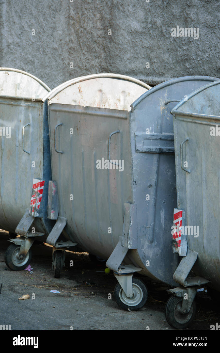 Row of urban steel containers for garbage Stock Photo - Alamy