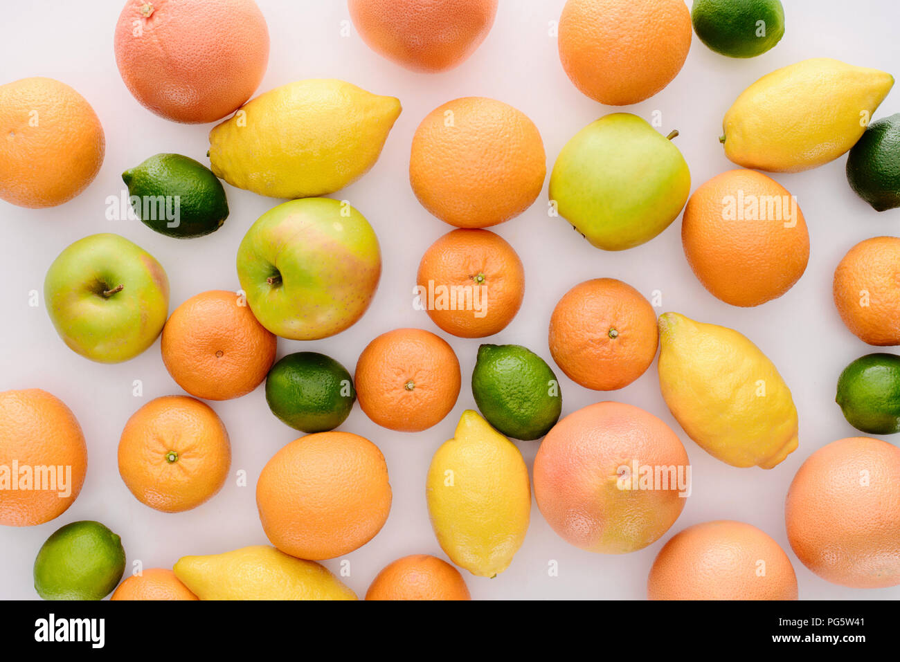 top view of various ripe fruits on white surface Stock Photo - Alamy