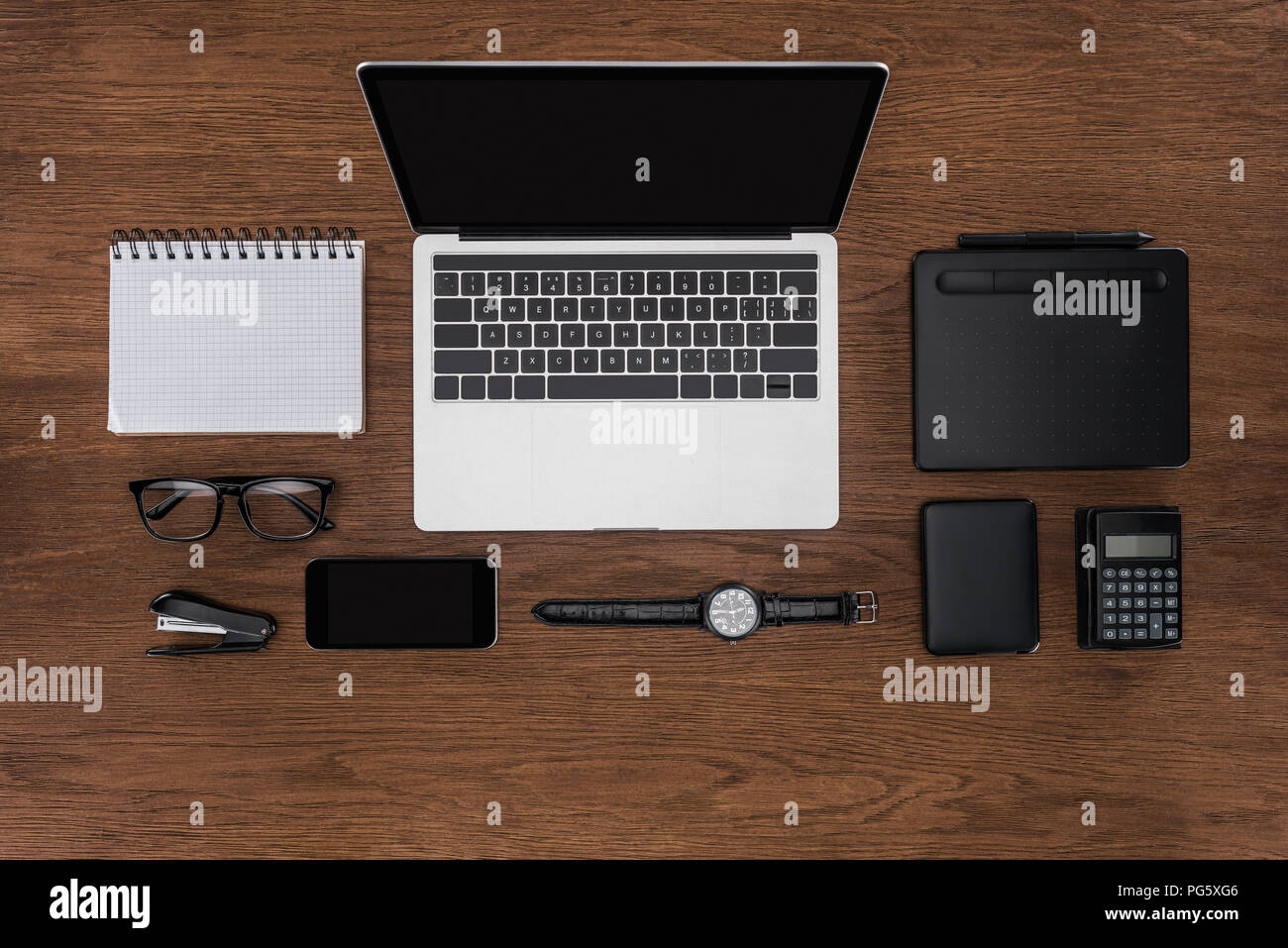 top view of workplace with arranged empty textbook, smartphone ...