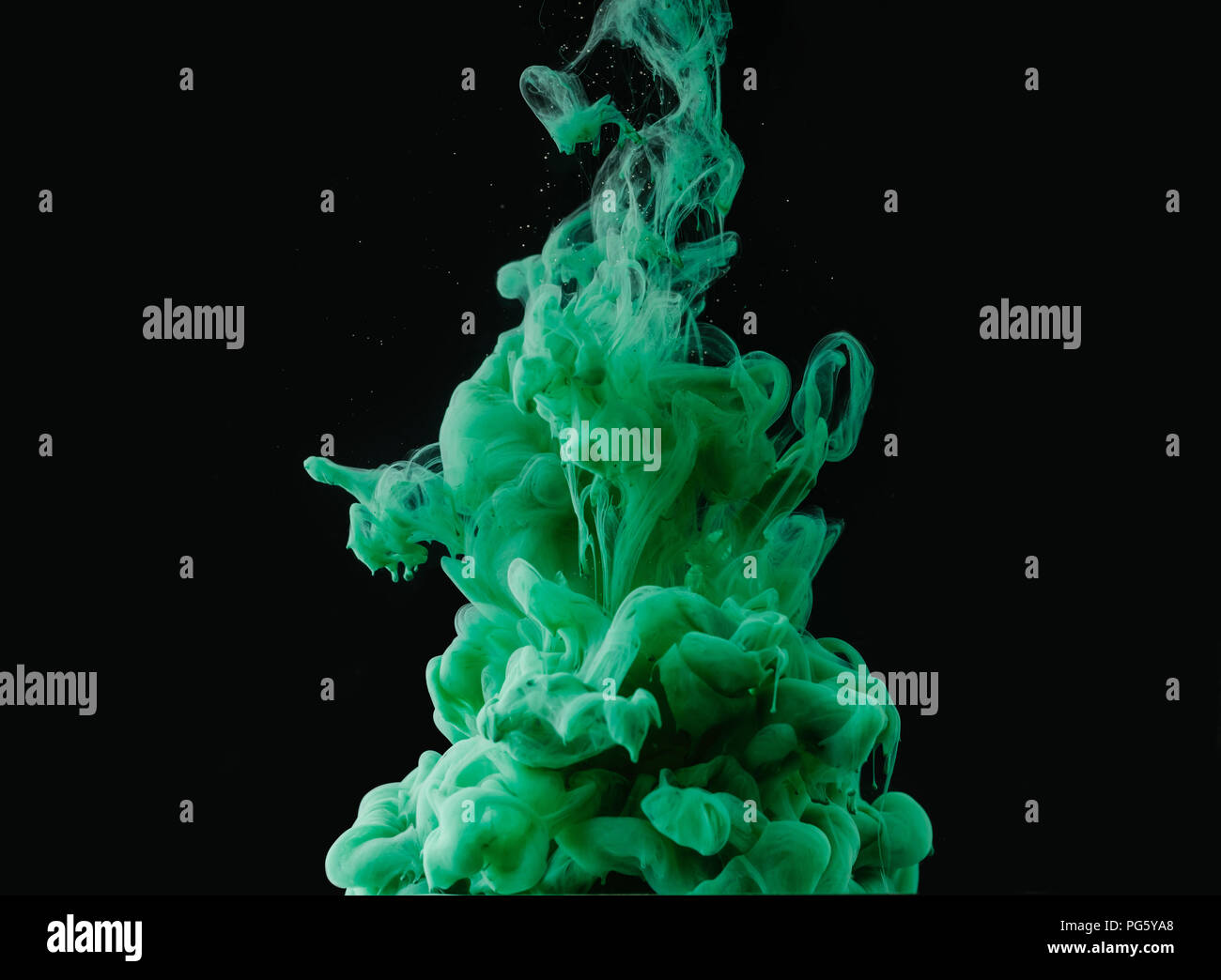 abstract green paint explosion on black background Stock Photo - Alamy