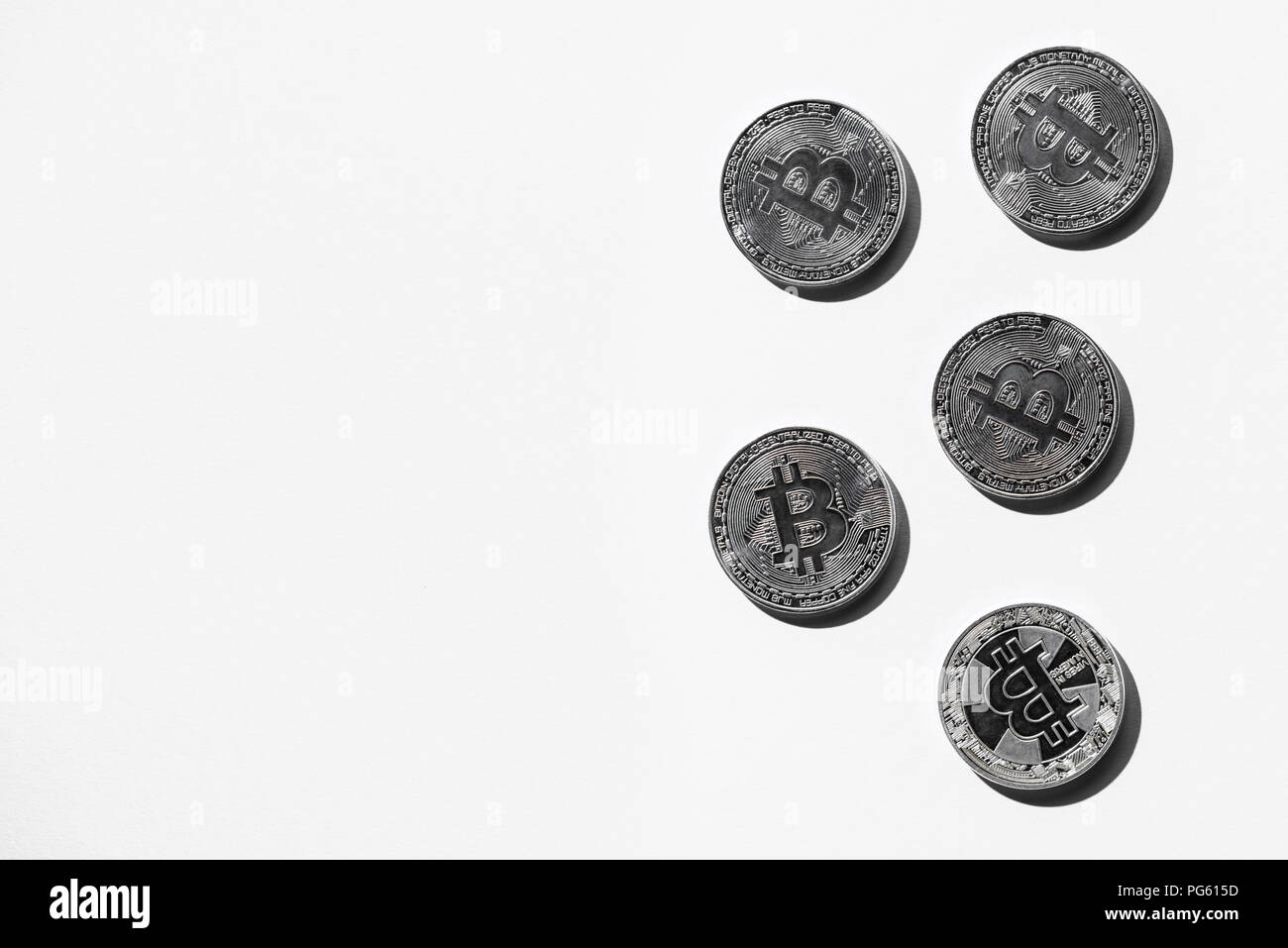 top view of arranged silver bitcoins on white backdrop Stock Photo - Alamy