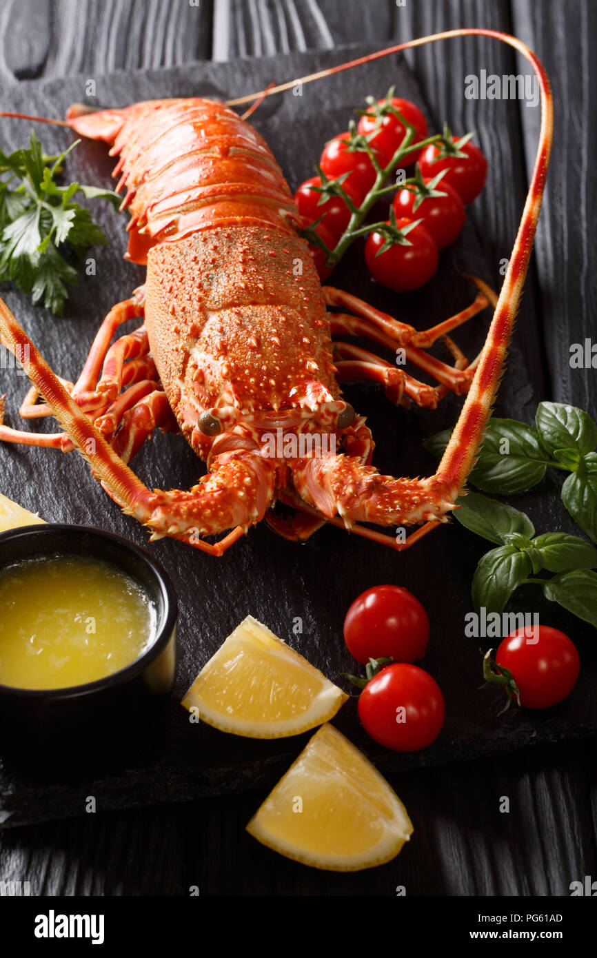 Expensive food: spiny boiled lobster with fresh tomato, lemon and ...