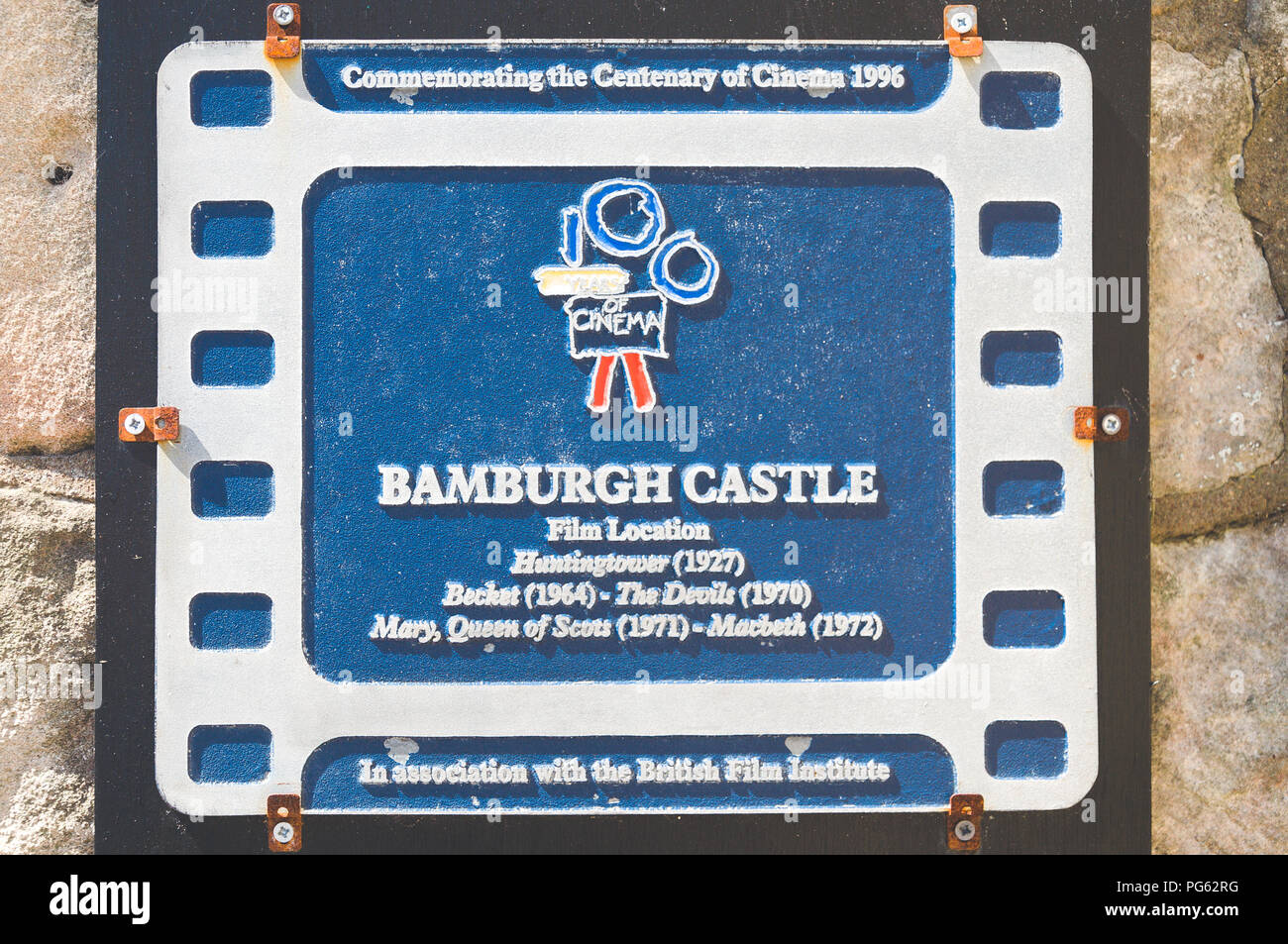 A plaque commemorating the film locations that Bamburgh Castle has been ...