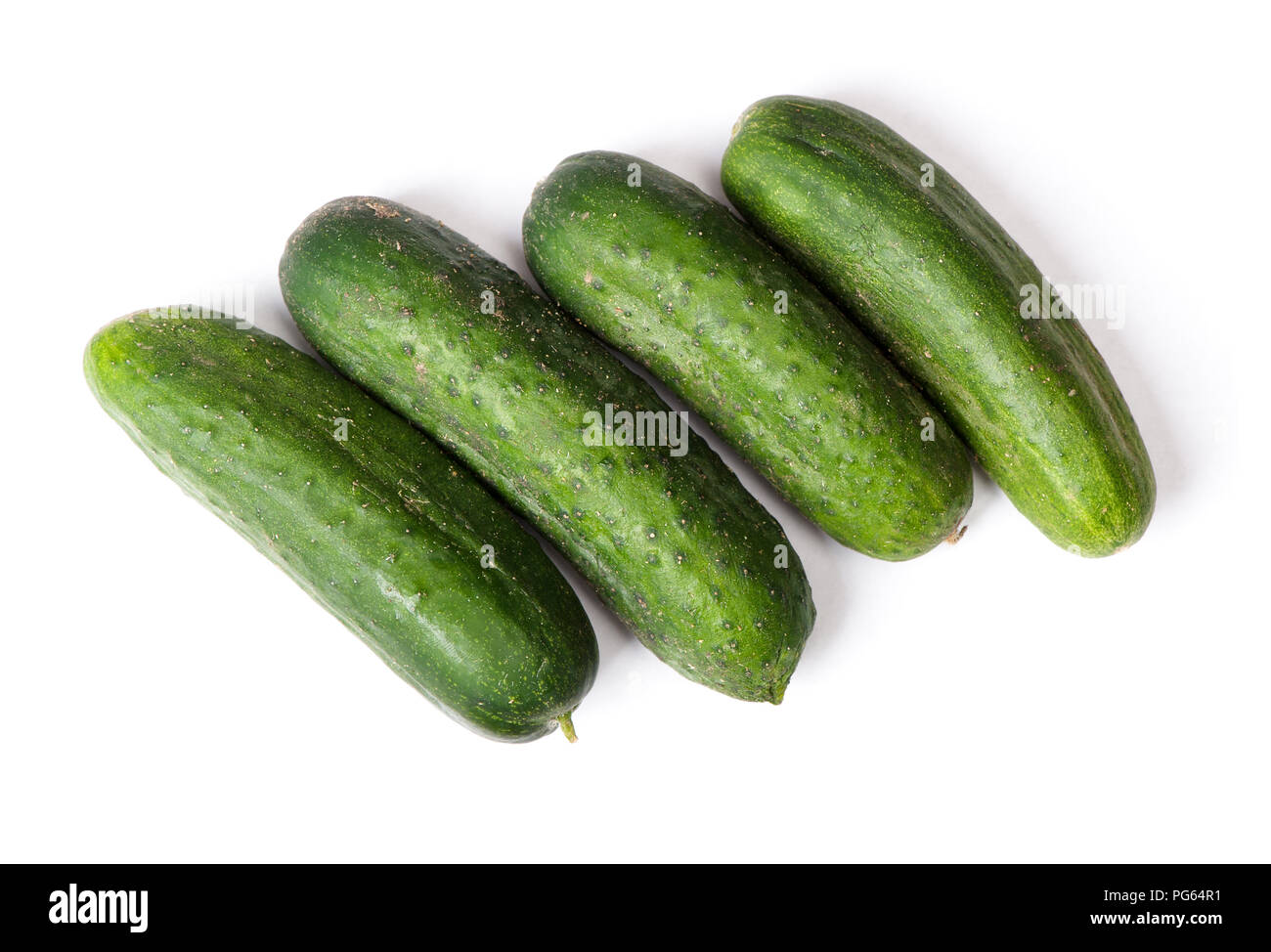 Group of natural cucumbers isolated on white background Stock Photo - Alamy