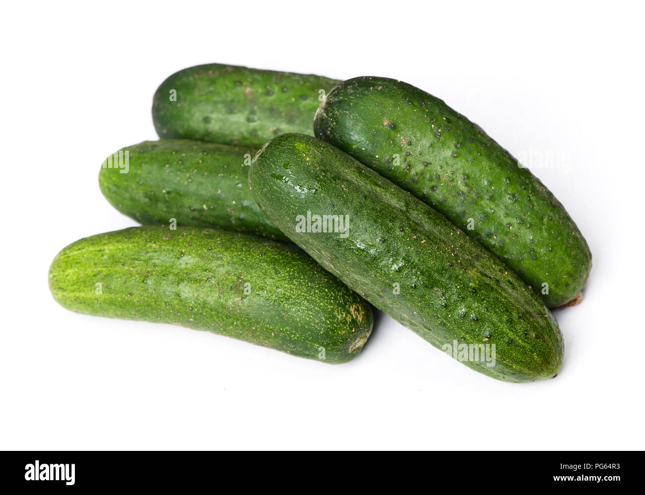Group of natural cucumbers isolated on white background Stock Photo - Alamy