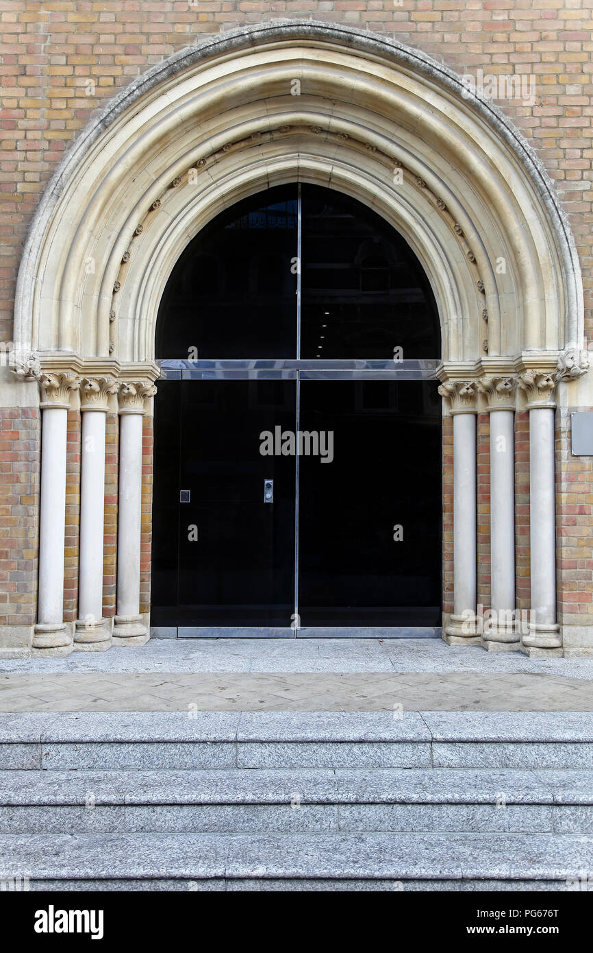 Medieval entrance with big arch and columns Stock Photo - Alamy