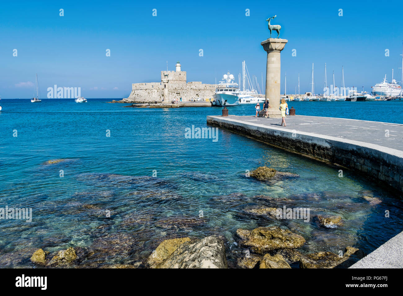 This is the famous entrance to the old harbour of Rodes City on the ...