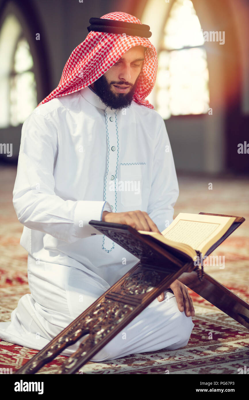 Religious muslim man praying inside the mosque Stock Photo - Alamy