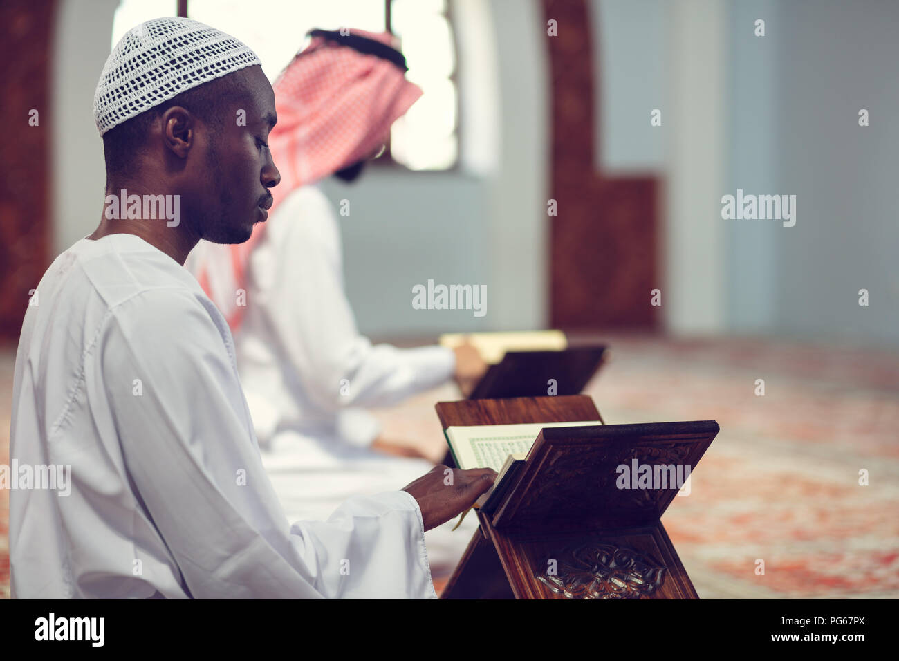 Two Religious muslim man praying inside the mosque Stock Photo - Alamy