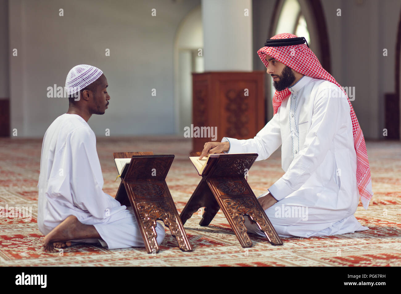 Two Religious muslim man praying inside the mosque Stock Photo - Alamy