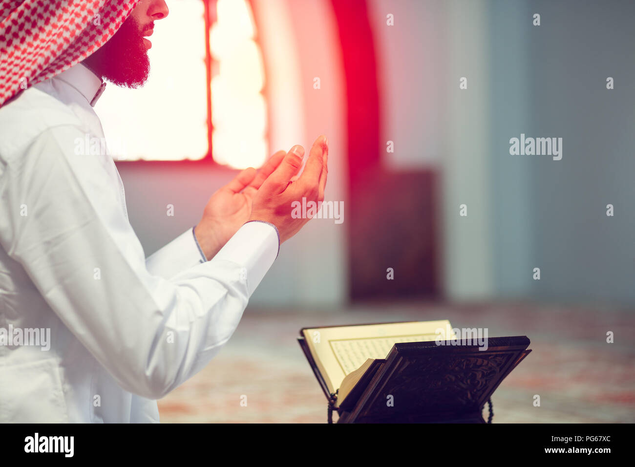 Religious muslim man praying inside the mosque Stock Photo - Alamy