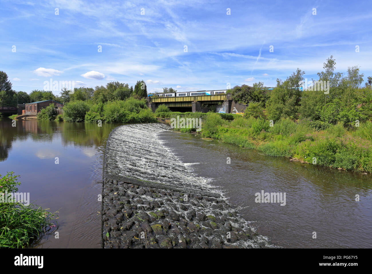 A Northern train crossing a viaduct by the River Don at Sanderson's ...