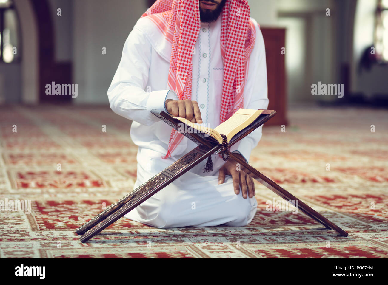 Religious muslim man praying inside the mosque Stock Photo - Alamy