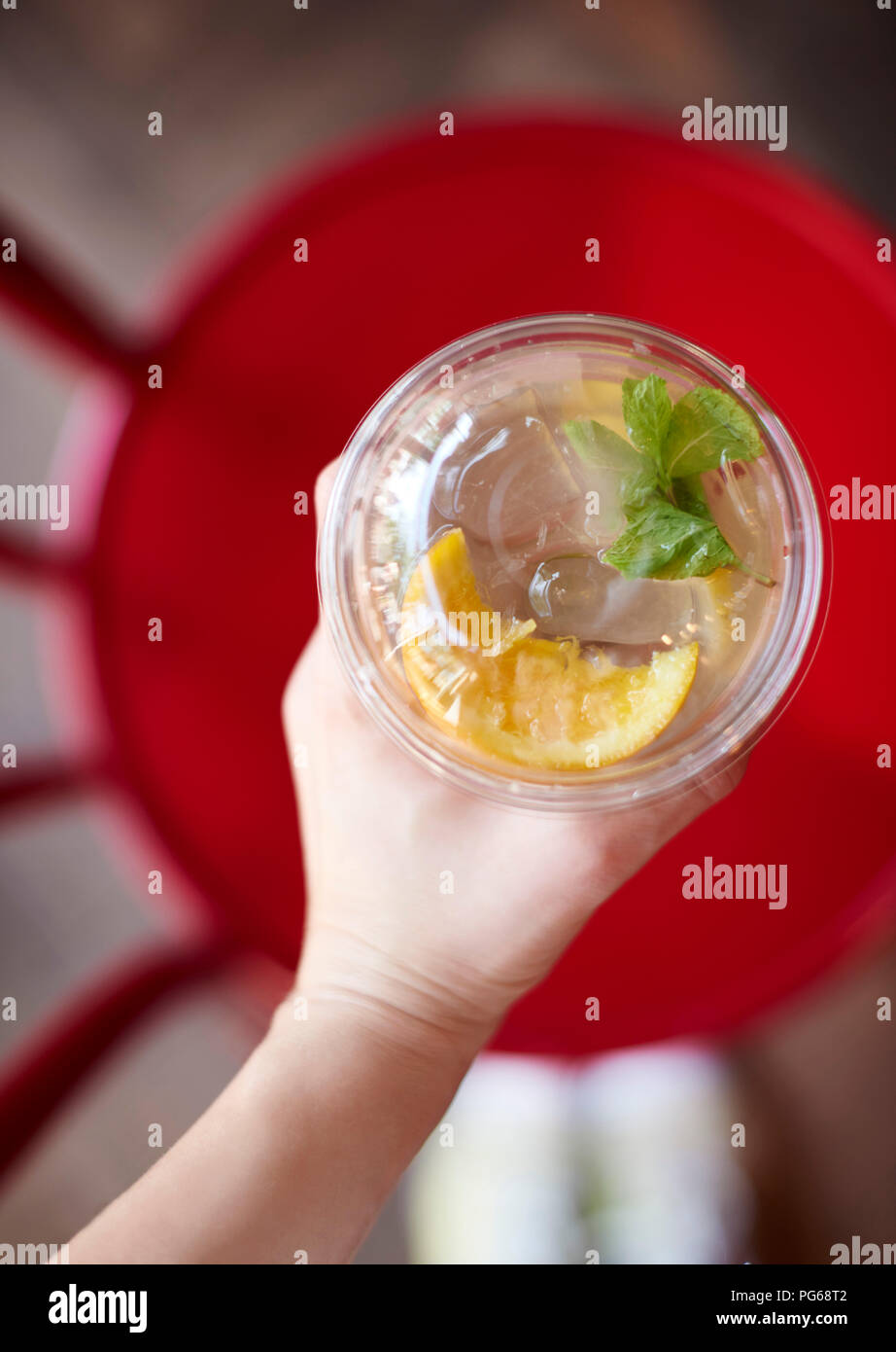 Womans hand holding glass lemonade hi-res stock photography and images ...