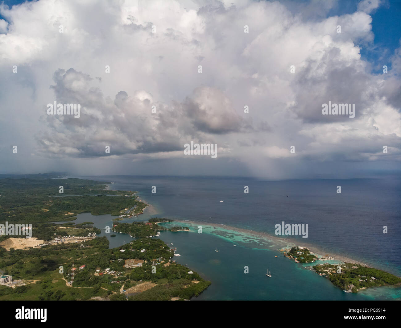 Aerial of tropical rain shower hi-res stock photography and images - Alamy