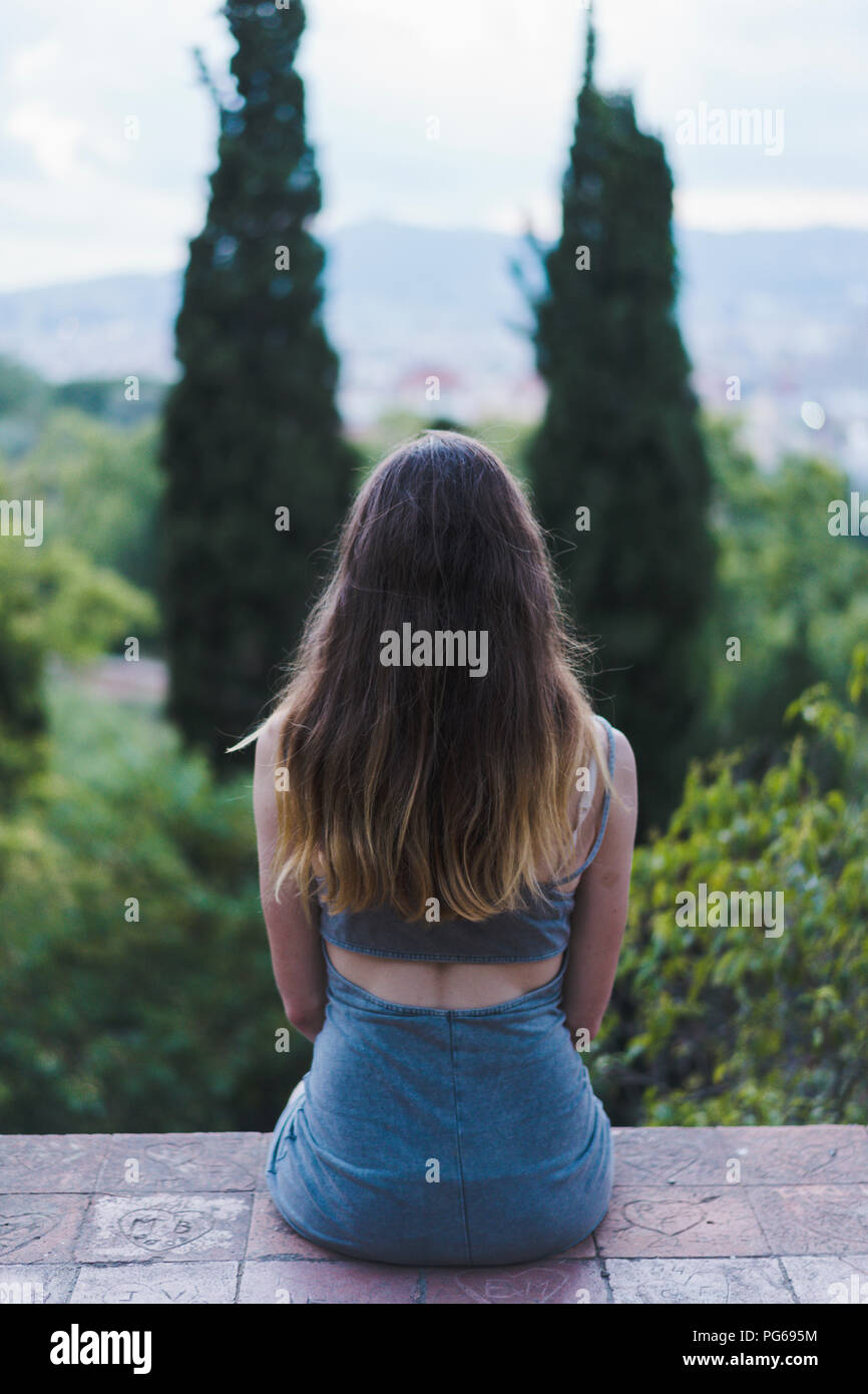 Rear woman sitting observation point montjuic hi-res stock photography ...