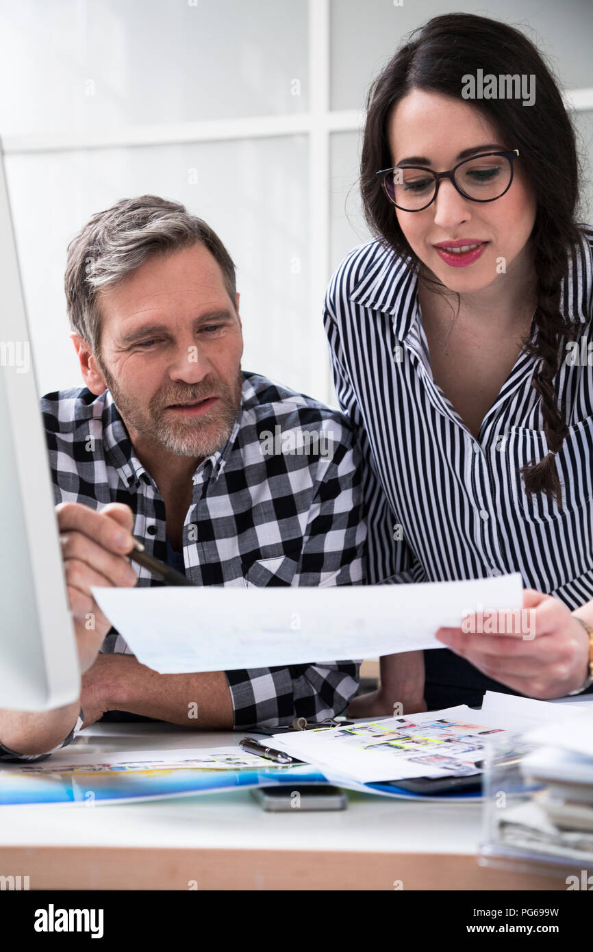 Colleagues in meeting room smile hi-res stock photography and images ...