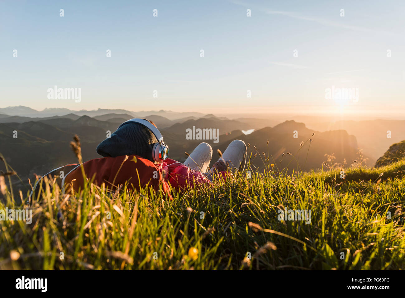 Hiker lying in grass hi-res stock photography and images - Alamy