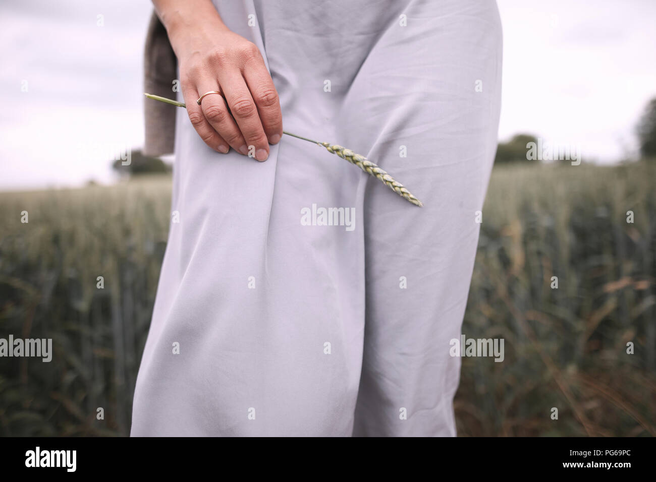 Womans hand holding ear hi-res stock photography and images - Alamy