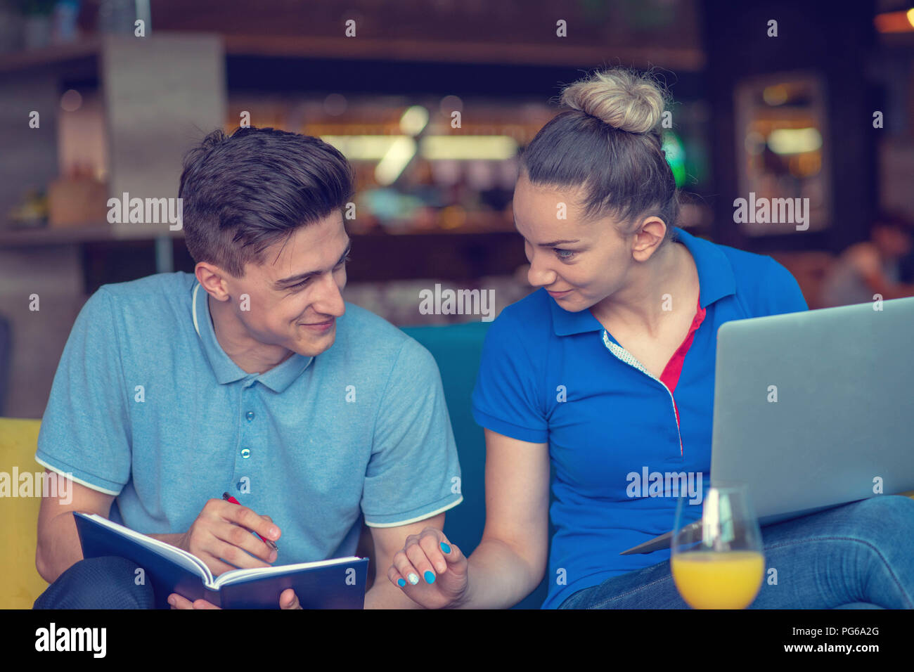 Man having drink in library hi-res stock photography and images - Alamy